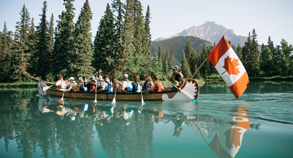 Bow River Big Canoe Tour | Banff & Lake Louise Tourism